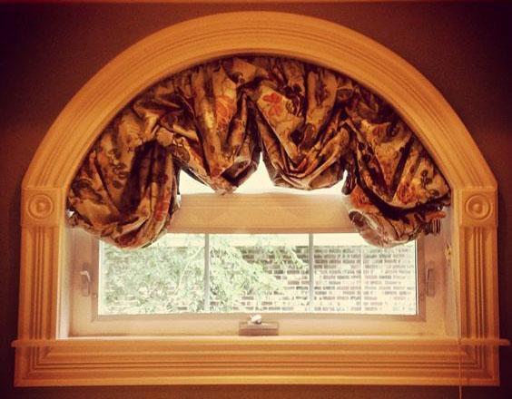 Oval Sunburst Window